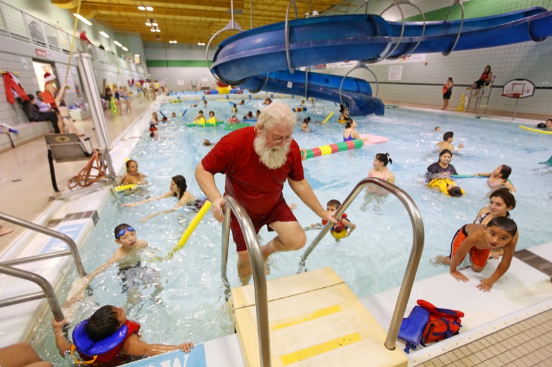 Santa going for a swim and a skate at the Sportsplex – Brandon Sun