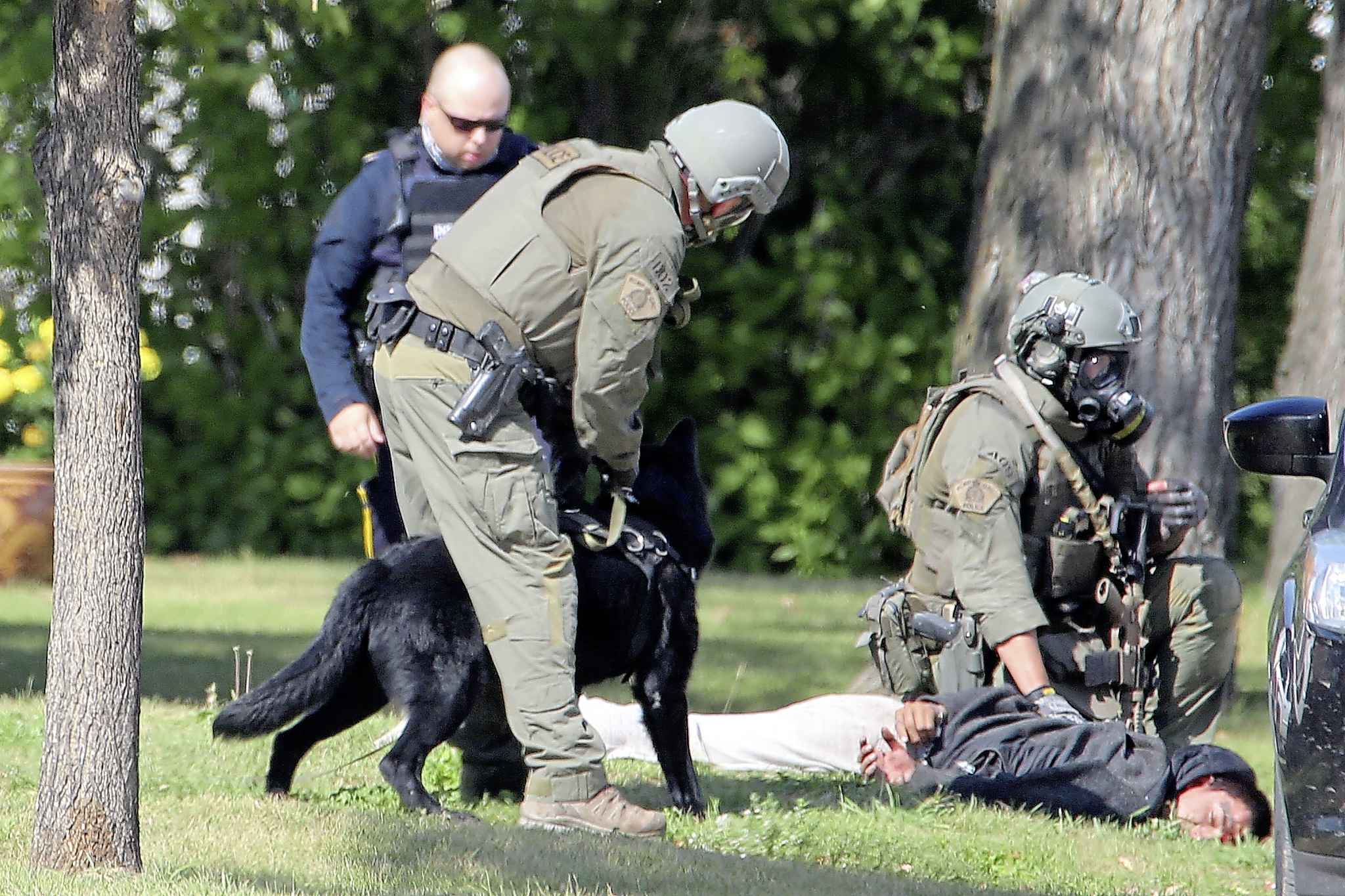 Accused gunman in officer shooting has no adult record; two other ...