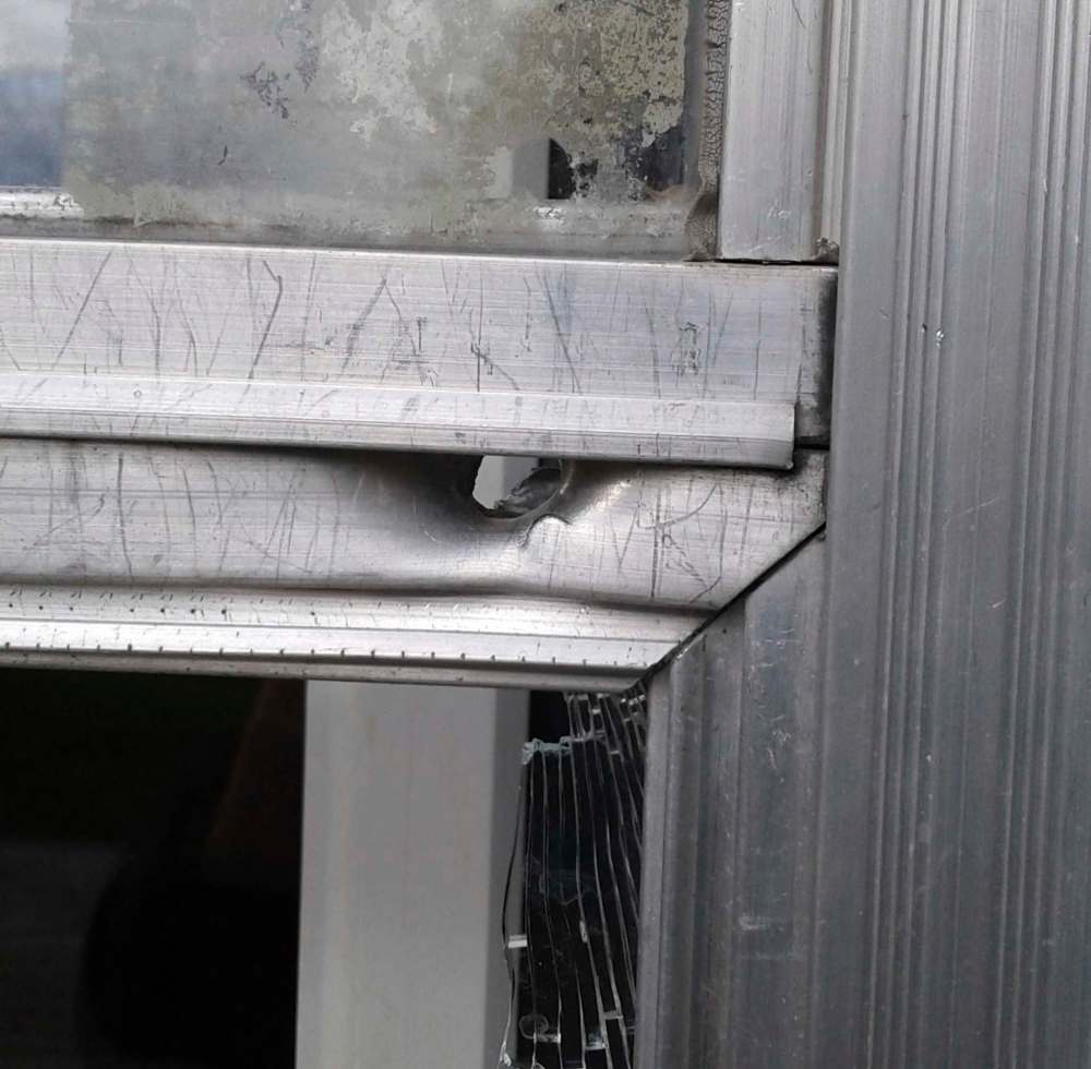 Bullet goes through window – Brandon Sun