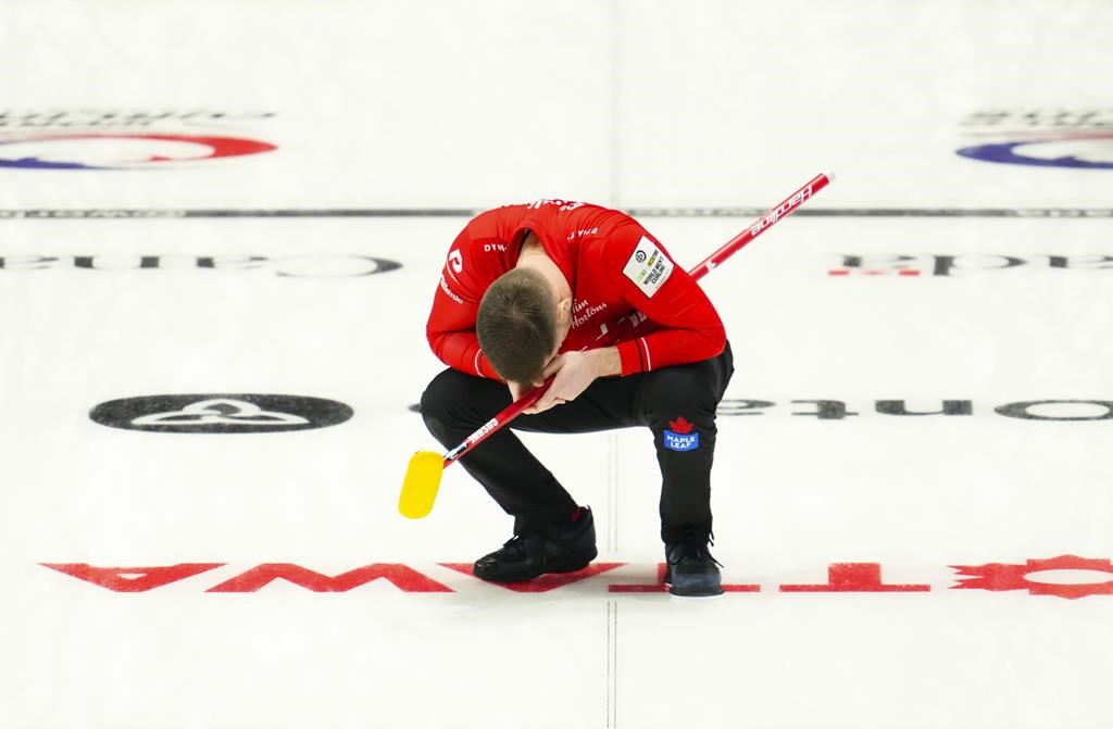Canada’s Gushue splits games on opening day at world men’s curling ...