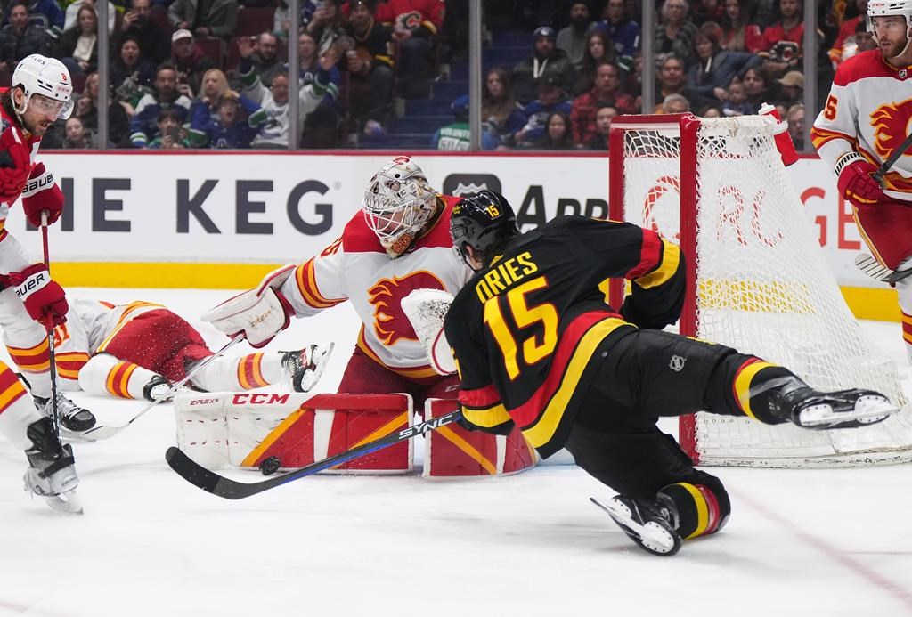 Canucks hand Flames 3-2 shootout loss, dimming Calgary’s playoff hopes ...