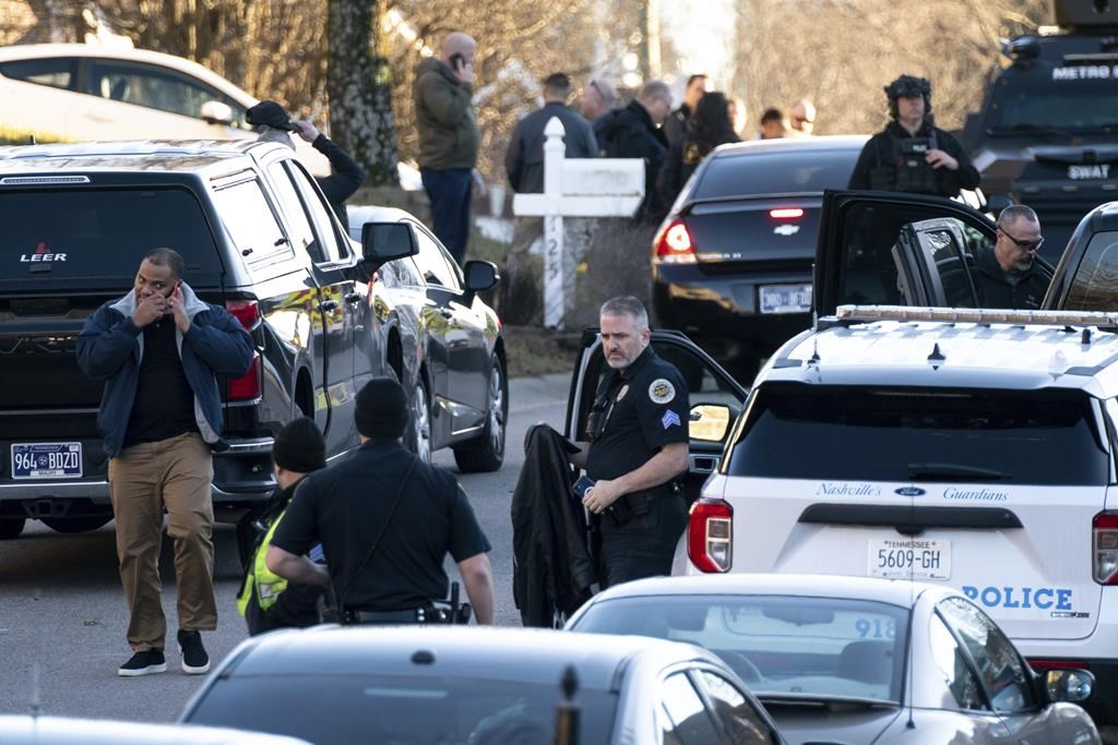 Investigation shows armed officer was hostage at home of Grammy winner ...