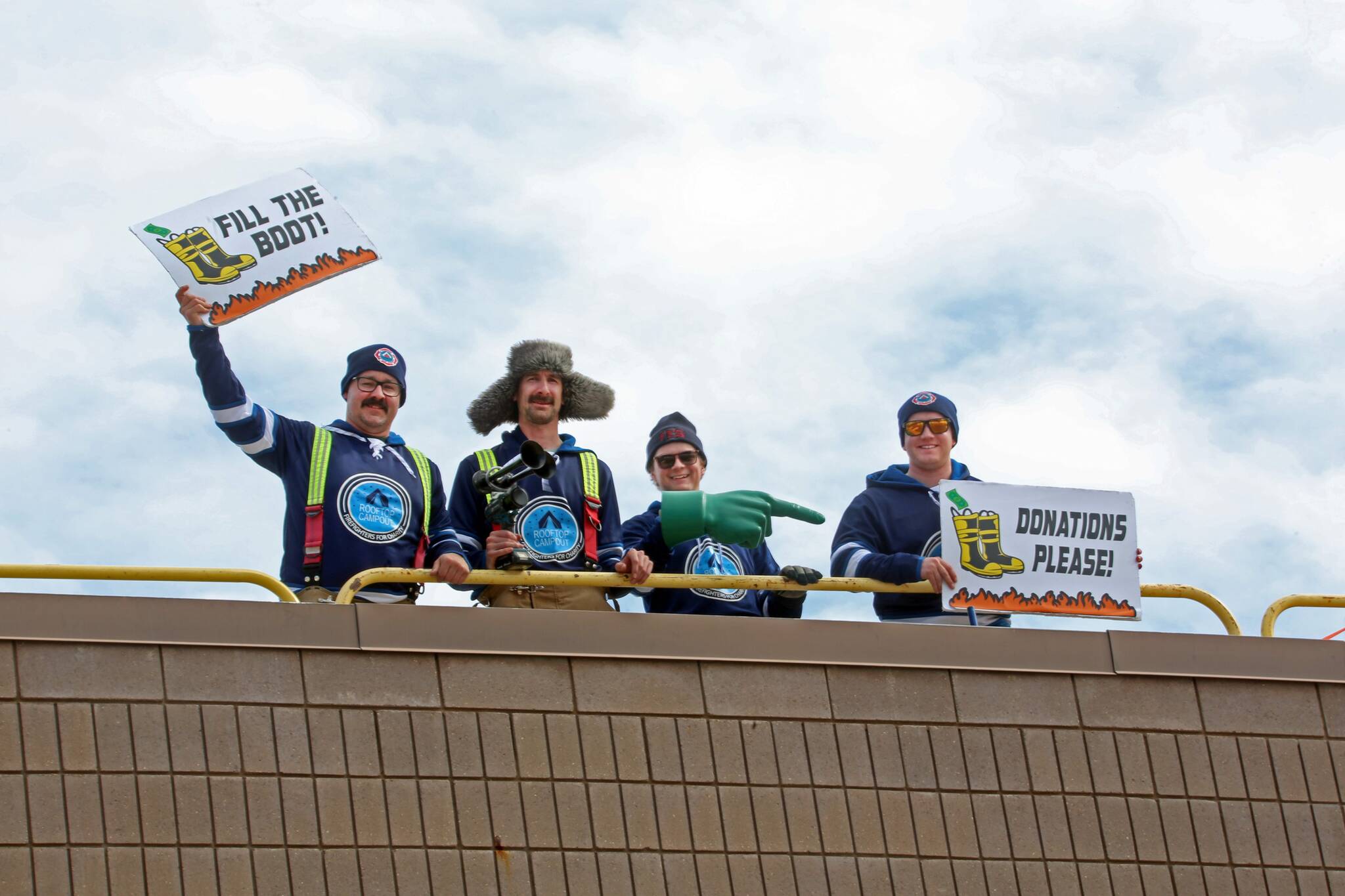 Firefighters brave elements, pass boot for charity – Brandon Sun