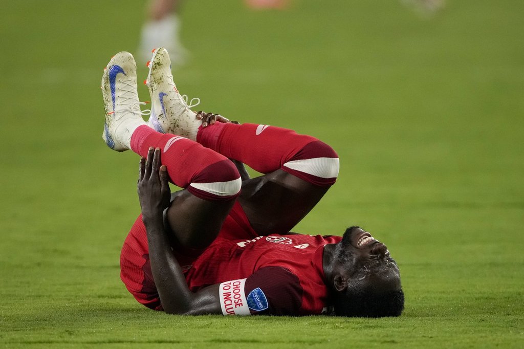 Blame game starts after Alphonso Davies goes down with a knee injury playing for Canada ...