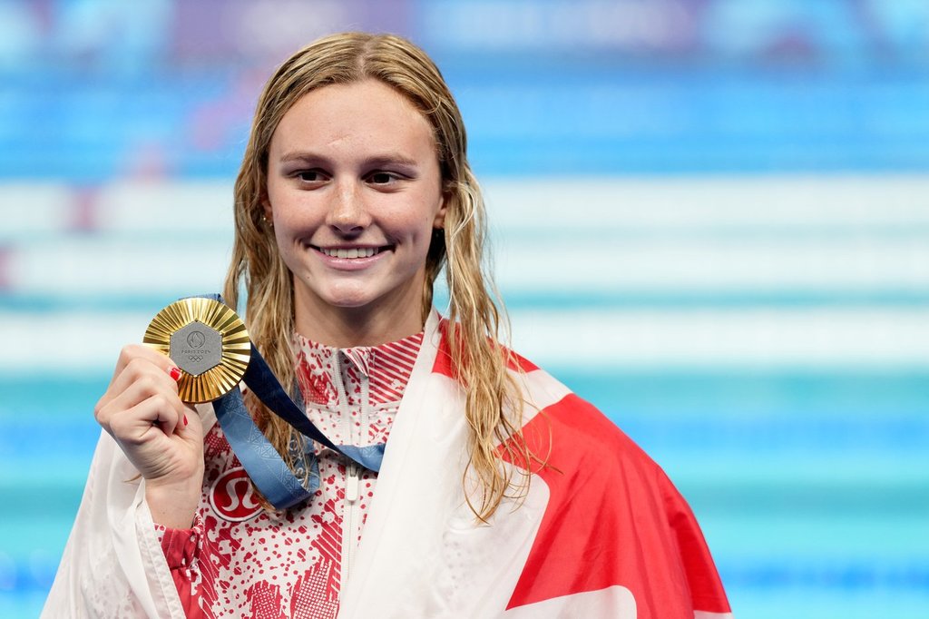 Star swimmer McIntosh sets world record in 200-metre individual medley ...
