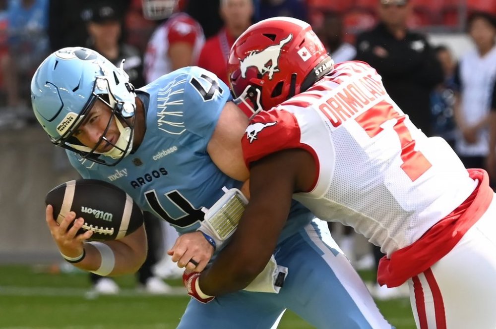 Mill, Adams Jr. score fourth-quarter TDs to lead Stampeders past Argos ...