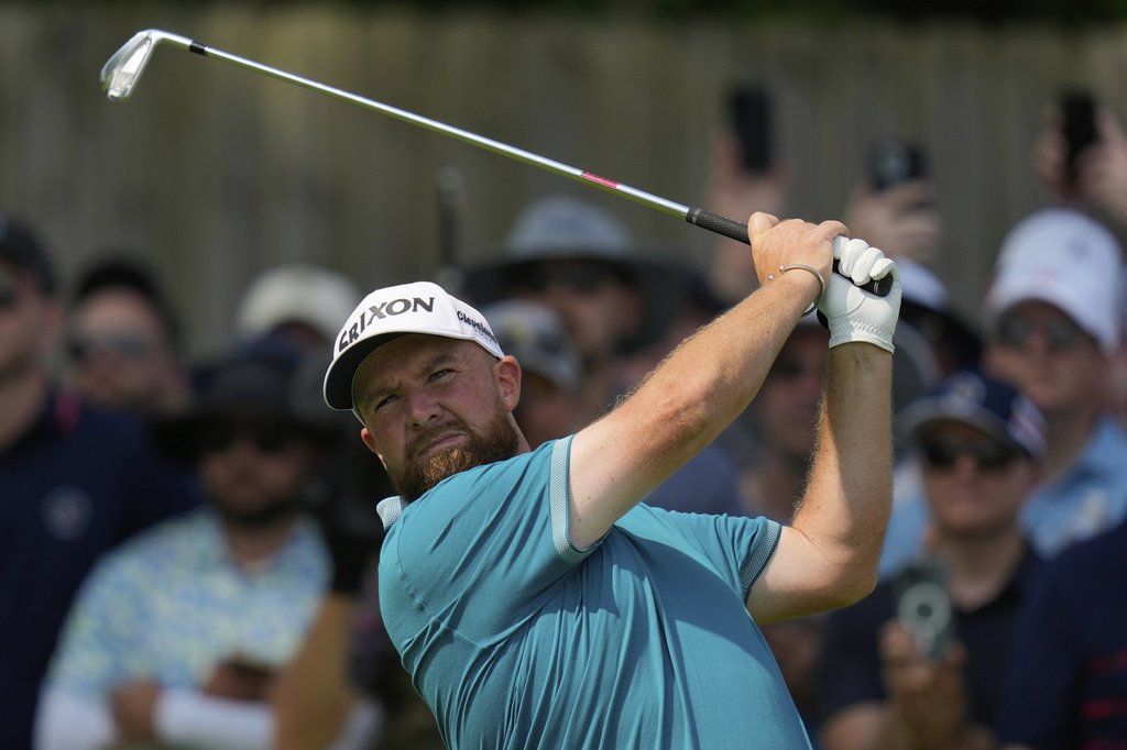 A US Open oops for Lowry, who gets a penalty after picking up his ball ...
