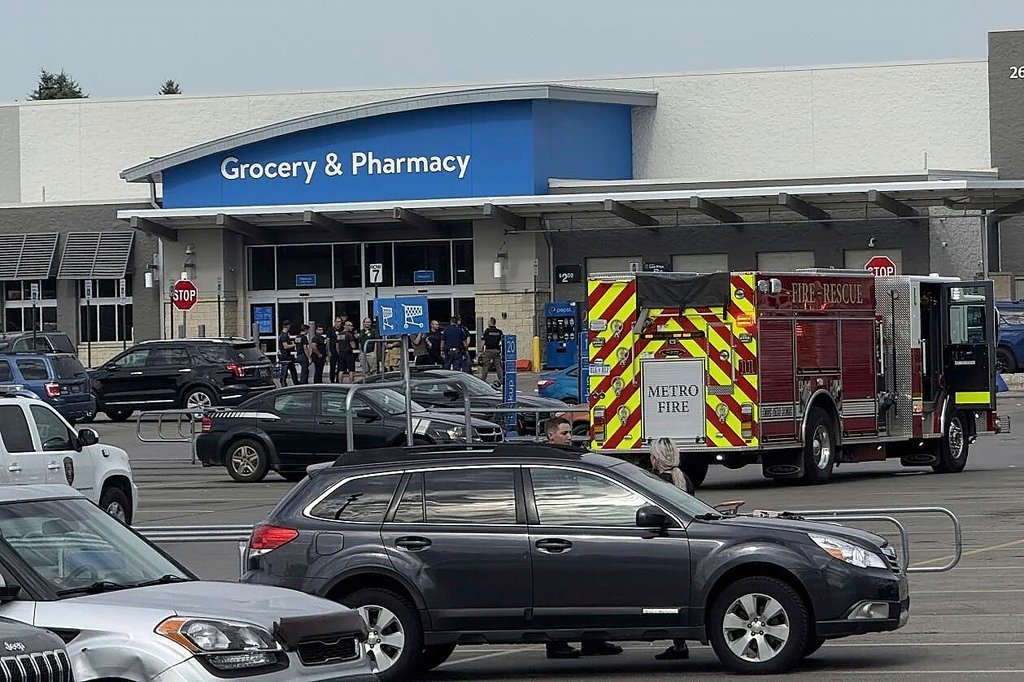 A man accused of stabbing 11 people at a Walmart is in Michigan ...