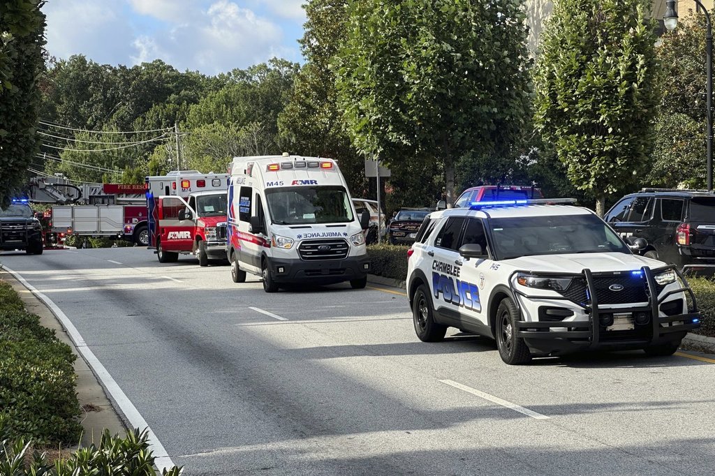 Suspected gunman and police officer dead in shooting near the CDC and ...