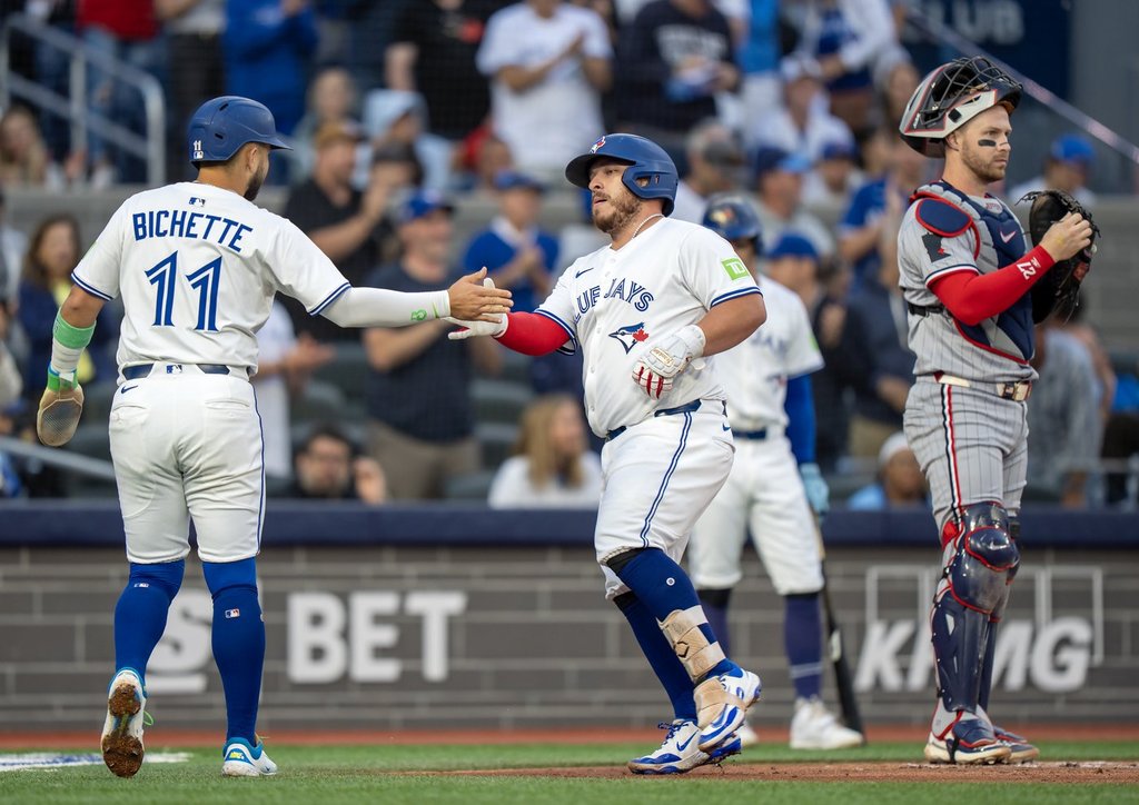 Kirk, Gimenez hit home runs to power Blue Jays to 10-4 rout of Twins ...