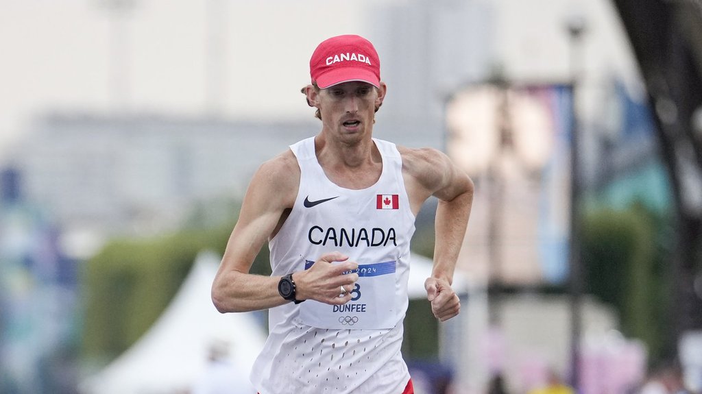 Dunfee wins gold in 35K race walk at World Athletics Championships ...