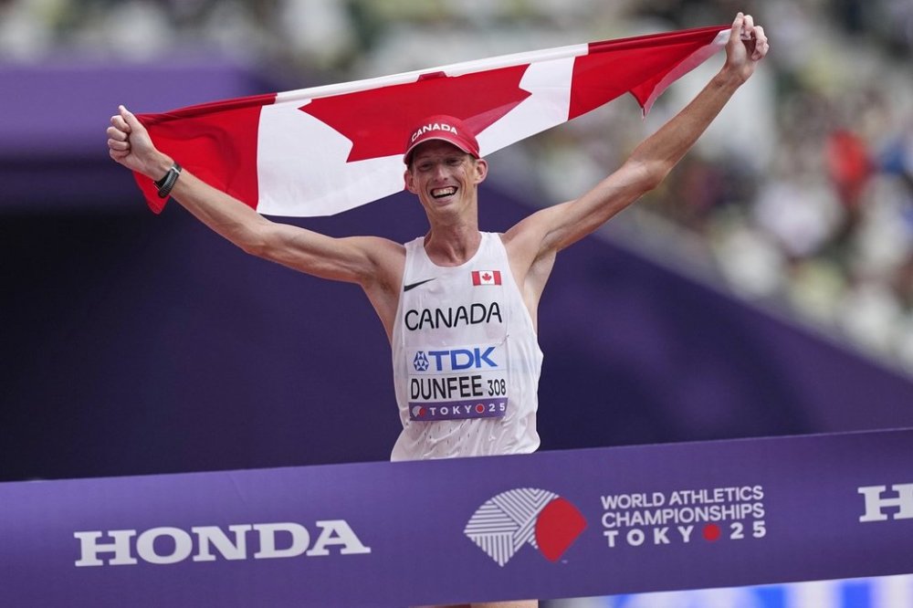 Dunfee wins gold in 35K race walk at World Athletics Championships ...