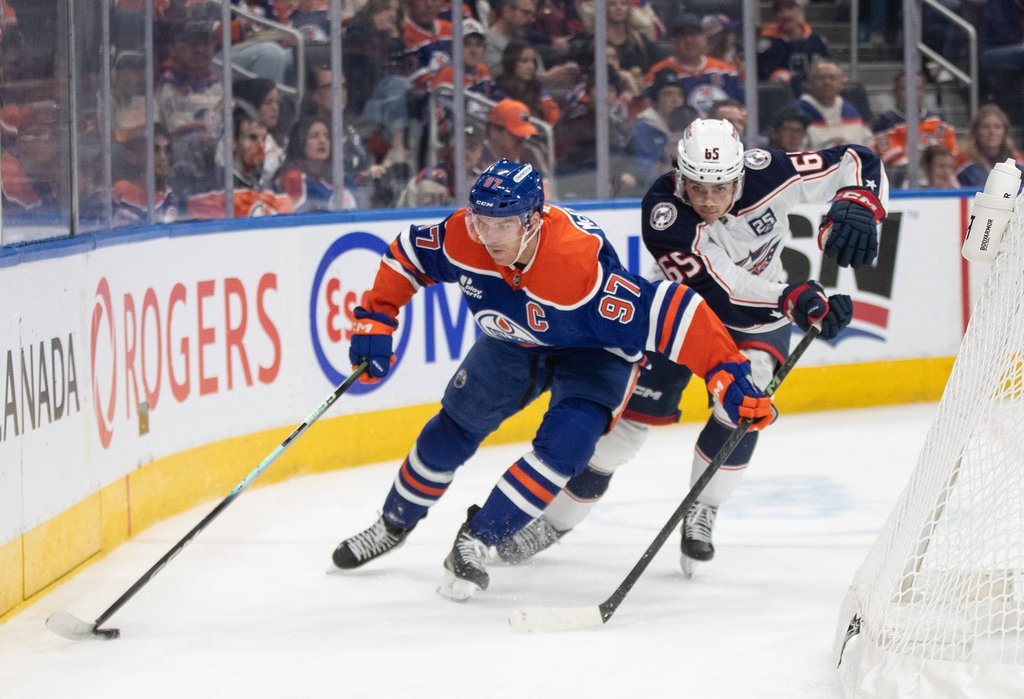 Oilers snap losing streak as McDavid ignites late rally to tip Blue ...
