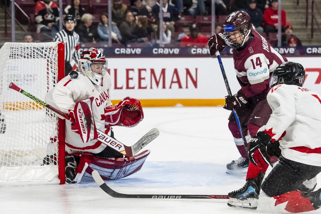 Hage scores in OT, Canada squeaks by Latvia 2-1 at world junior hockey ...