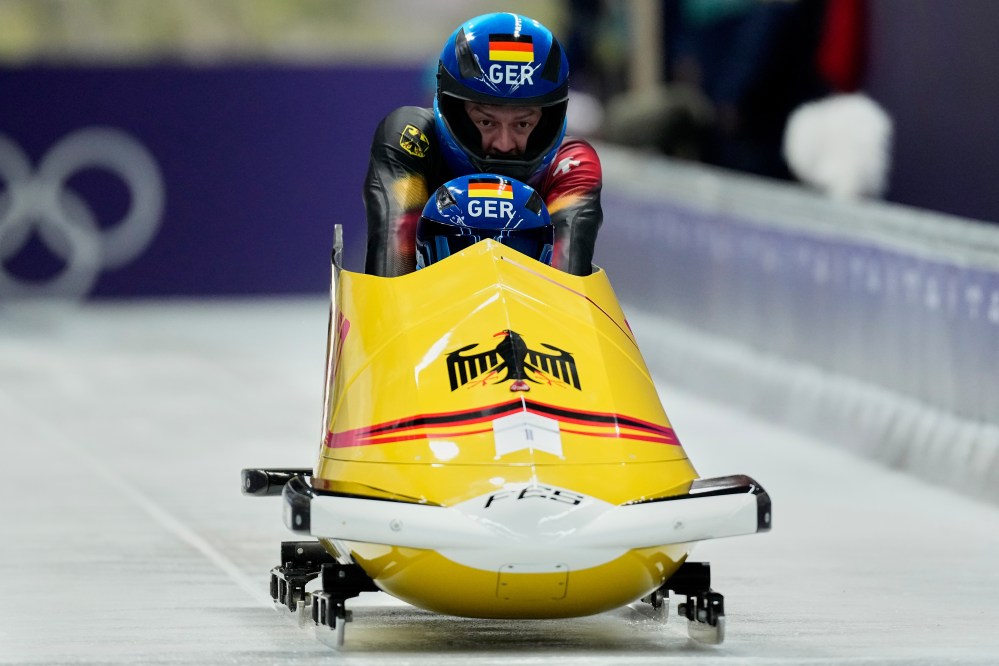 Germany’s Johannes Lochner starts fast in Olympic 2-man bobsled race ...