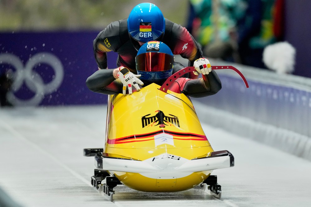 Germany’s Johannes Lochner starts fast in Olympic 2-man bobsled race ...