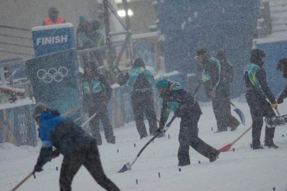Athletes and fans brave the snow and cold at the Winter Games, in ...