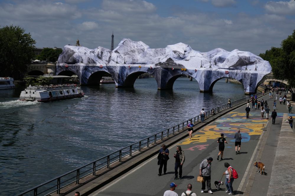Artist JR, the ‘French Banksy’ creates a ‘cave’ installation over Paris ...