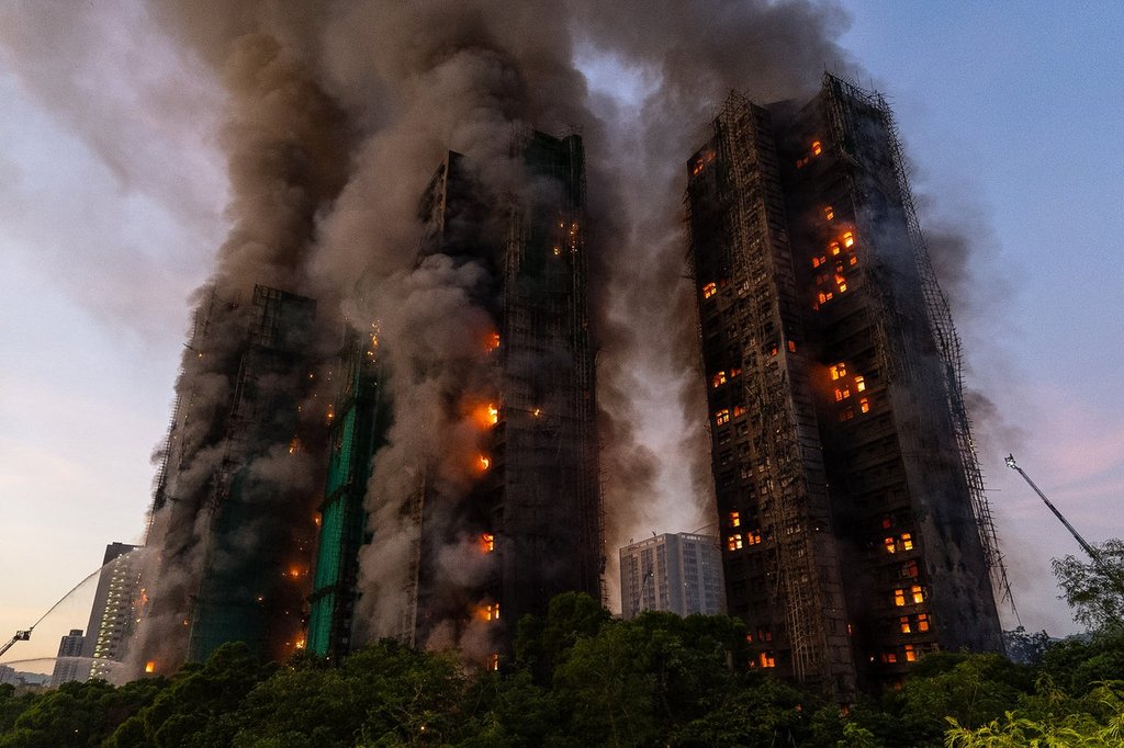 Hong Kong charges 7 people and 2 firms over deadly fire that killed 168 ...