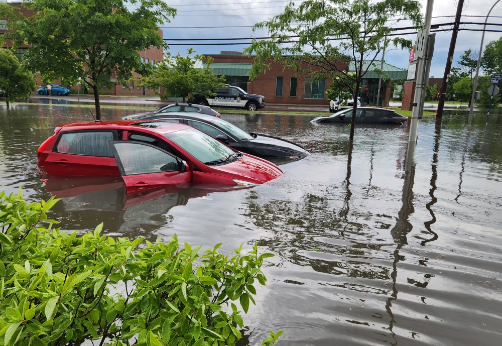 Heavy rain causes flooding and power outages across Montreal area ...