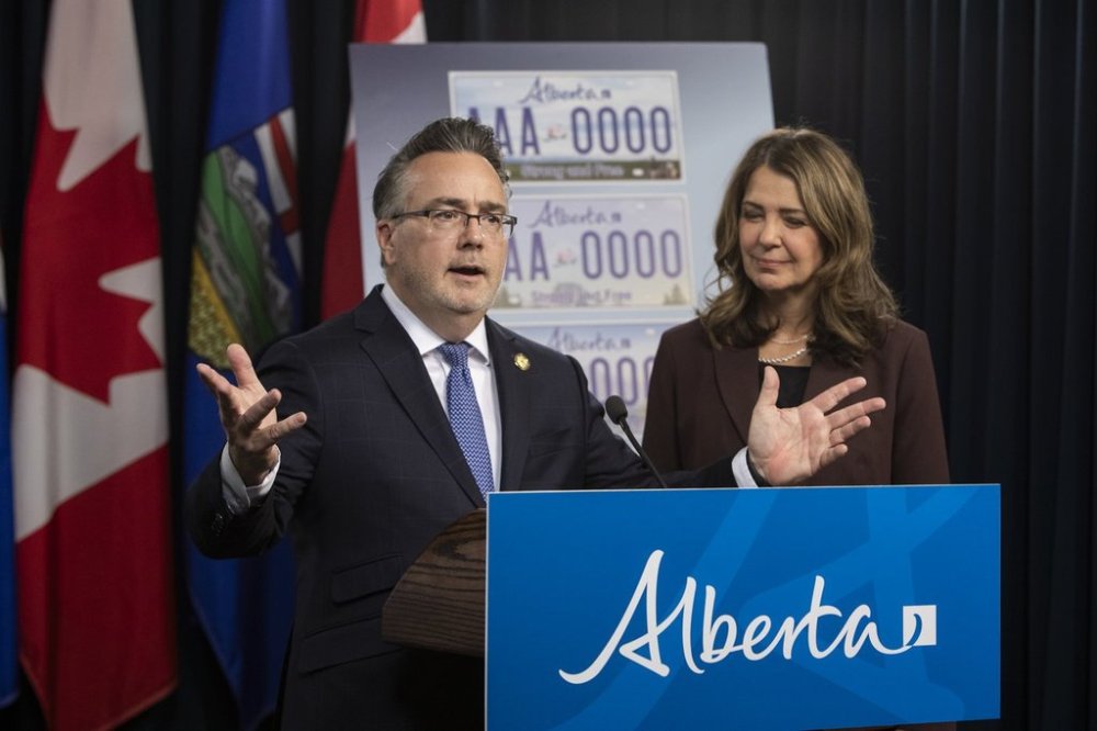 Alberta nixes booze price hike after premier, Calgary mayor snipe at ...